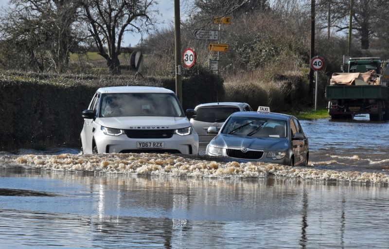 UK roads frequently get flooded, leaving motorists stranded or with a ...
